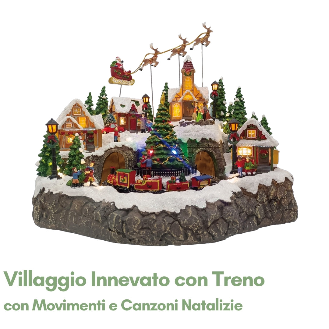Villaggio di Natale Innevato con Treno Rotante e Albero Illuminato ...